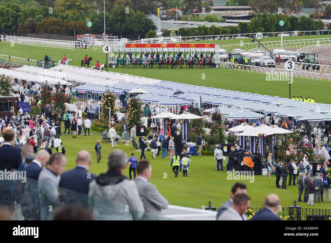 Melbourne, Australia. 01st Nov, 2022. Jockeys and people take part ...