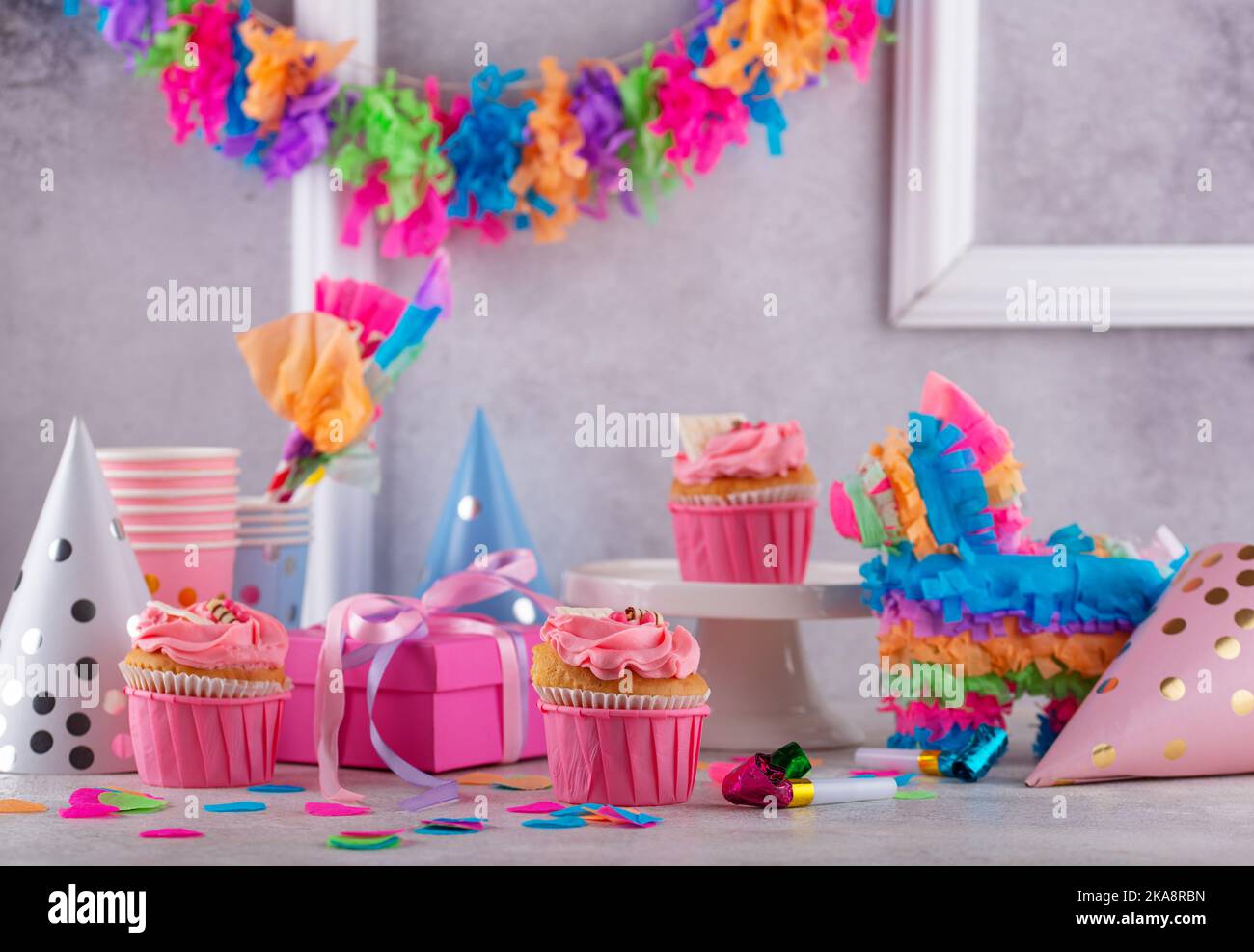 Birthday party concept with cupcake Stock Photo - Alamy