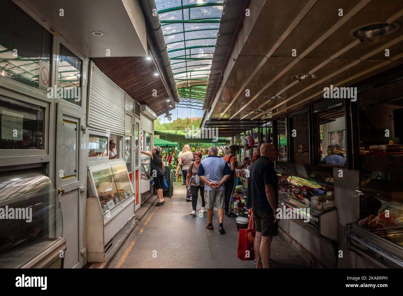Picture of stalls of Subotica Mlecna Pijaca in Serbia, with crowd of ...