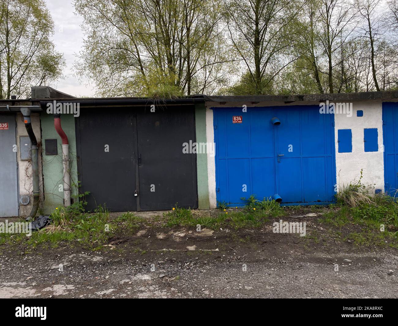 A view of old parking garages in street Stock Photo - Alamy
