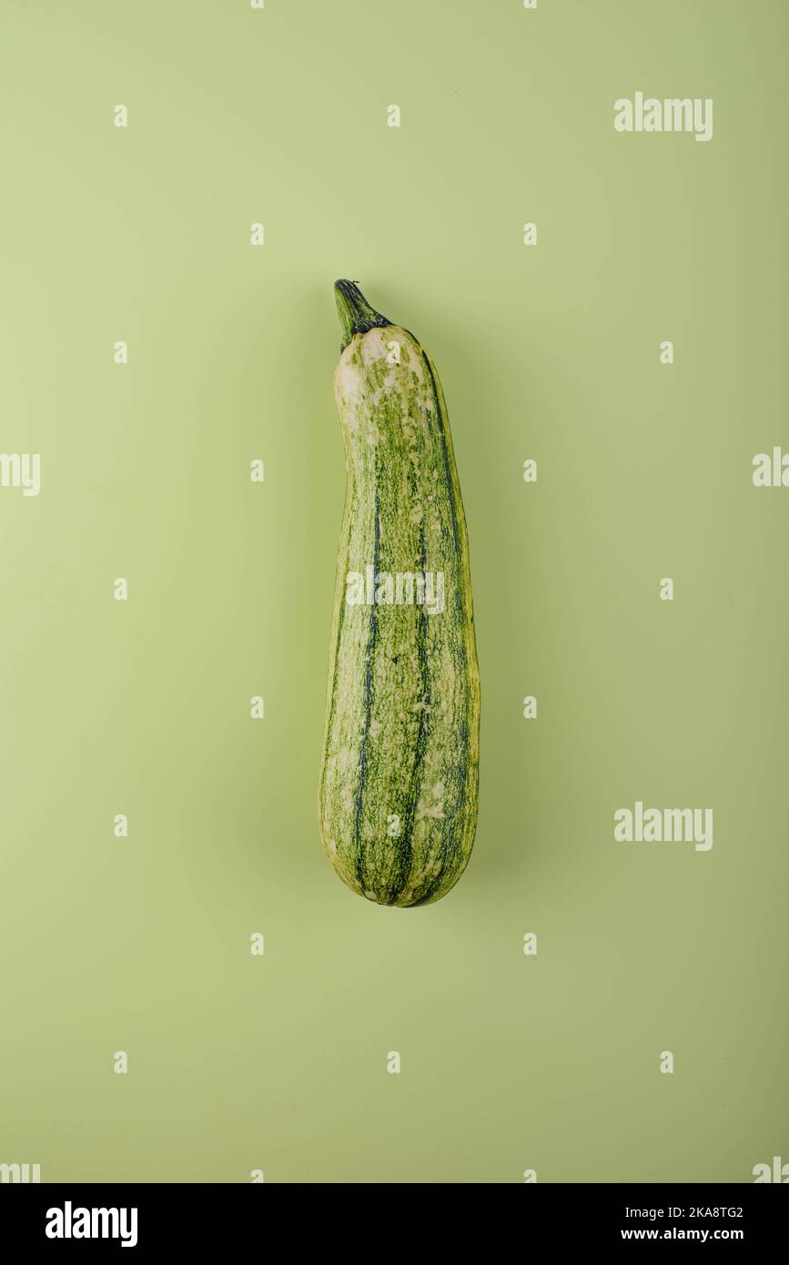 Squash on green background. Harvest concept Stock Photo - Alamy