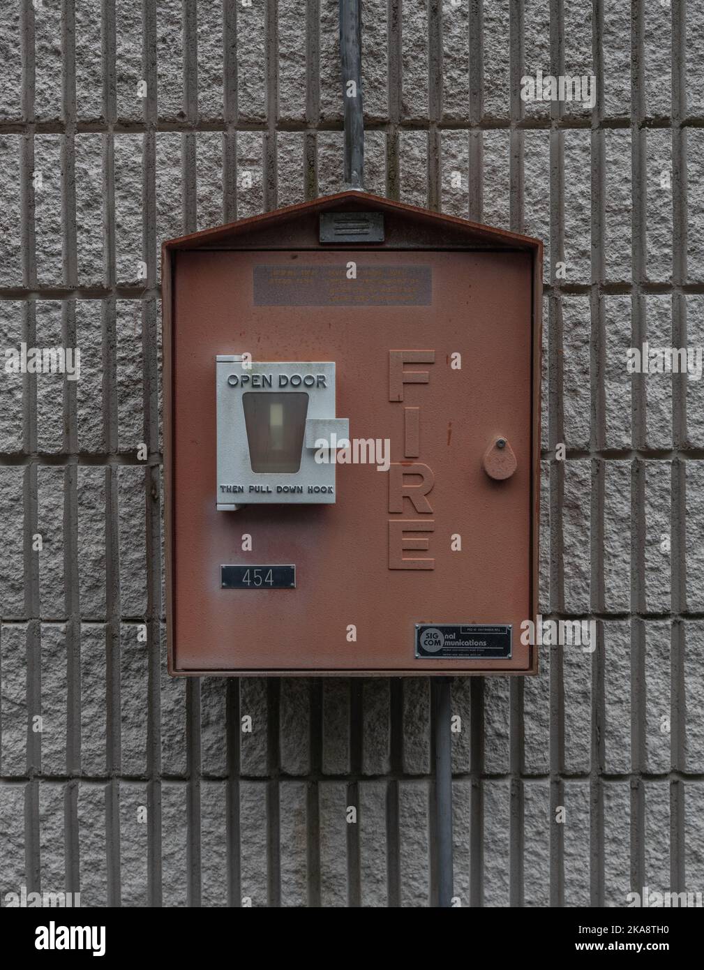 A view of a fire department fire alarm box outside a commercial ...