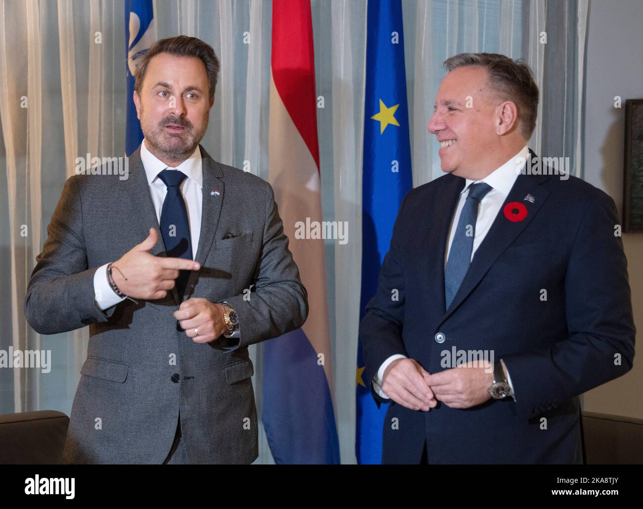 Quebec Premier Francois Legault, right, chats with Luxembourg Prime ...