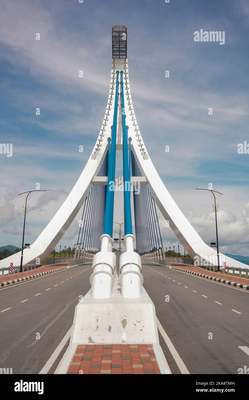 A tall and long bridge connecting the lands at two ends which is ...