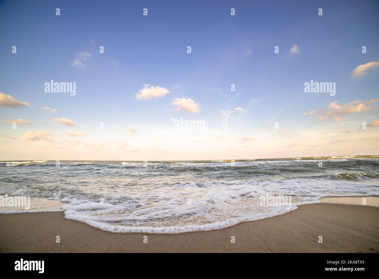 Beautiful scenic of sea wave with the sunlight shading in background at ...