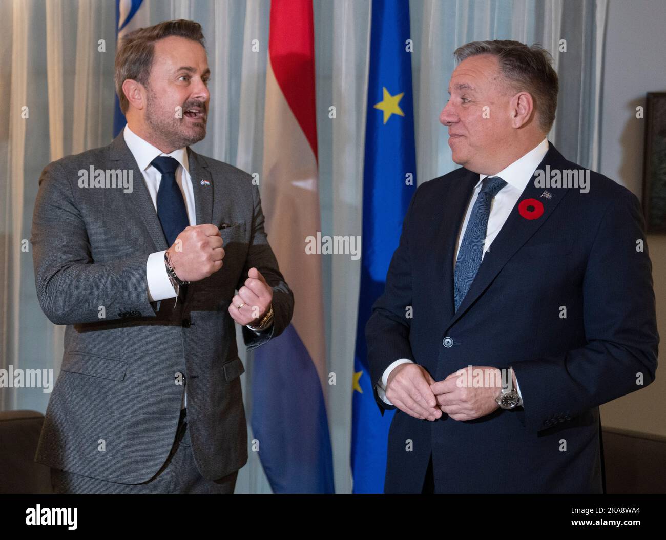 Quebec Premier Francois Legault, right, chats with Luxembourg Prime ...