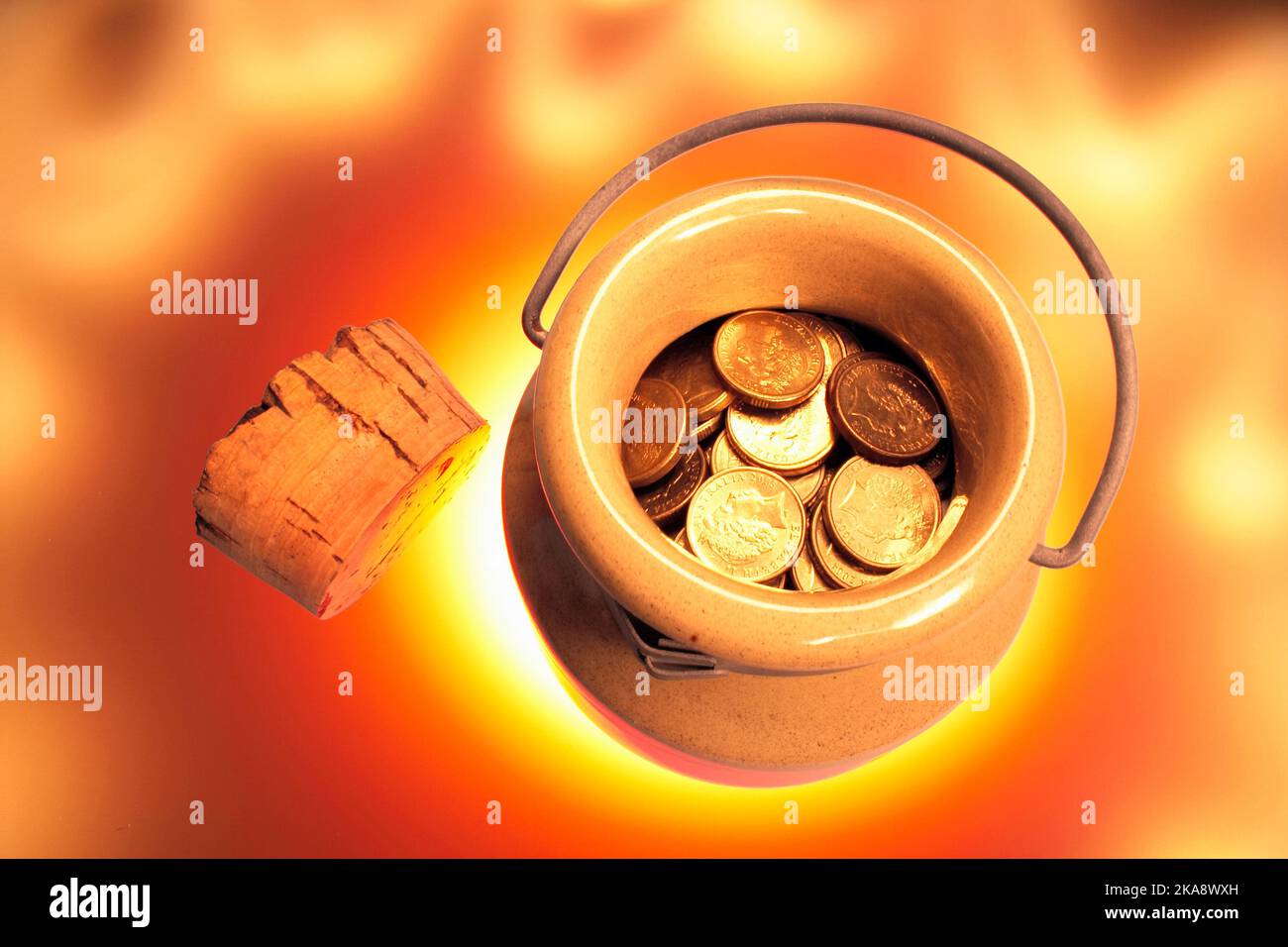 Coins in Ceramic Jar Stock Photo - Alamy