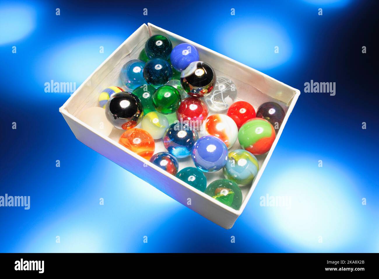 Marbles in Box Stock Photo - Alamy