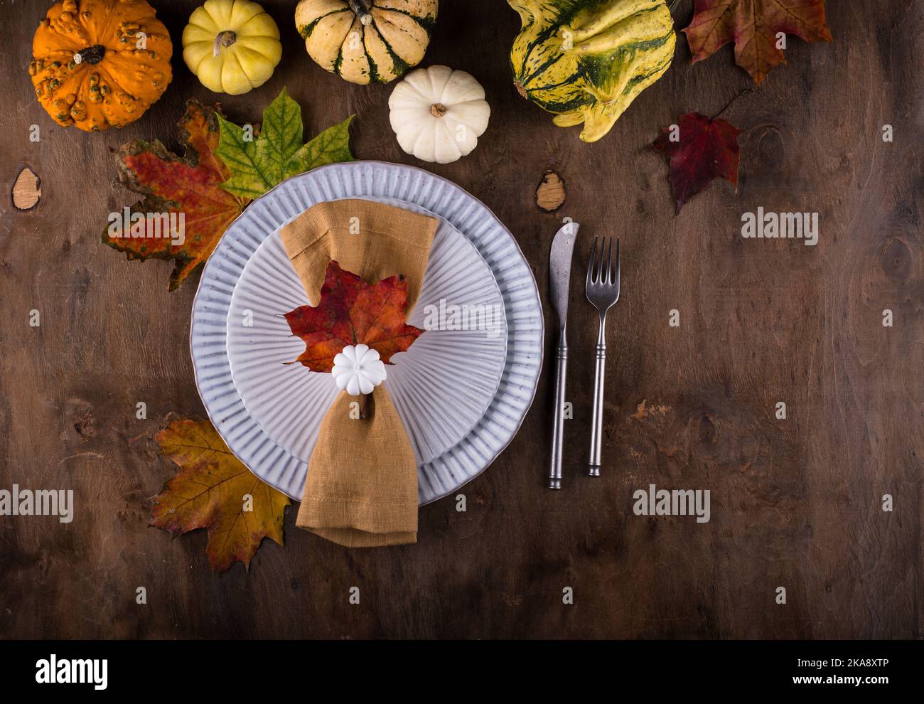 Autumn fall Thanksgiving table setting Stock Photo - Alamy