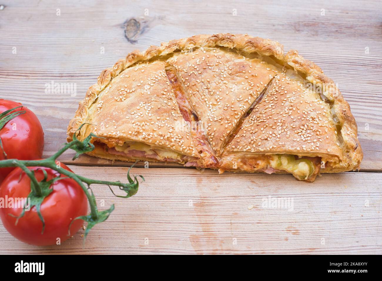 traditional pie, covered pizza baked in wood with wood Stock Photo - Alamy