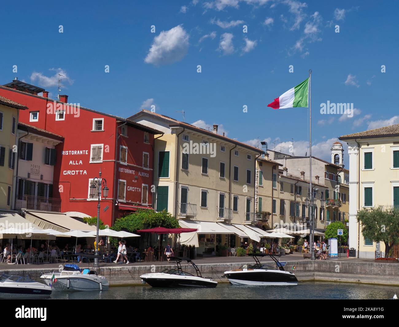 restaurants line the waterfront at Porto Lasize horbour, Lazise, Lake ...