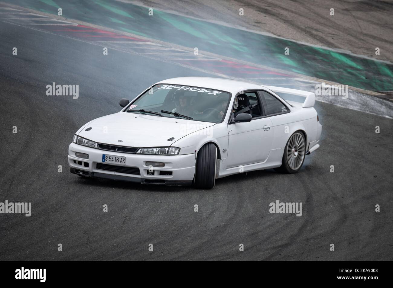 Nissan Silvia S14 drifting on the racing circuit Stock Photo - Alamy