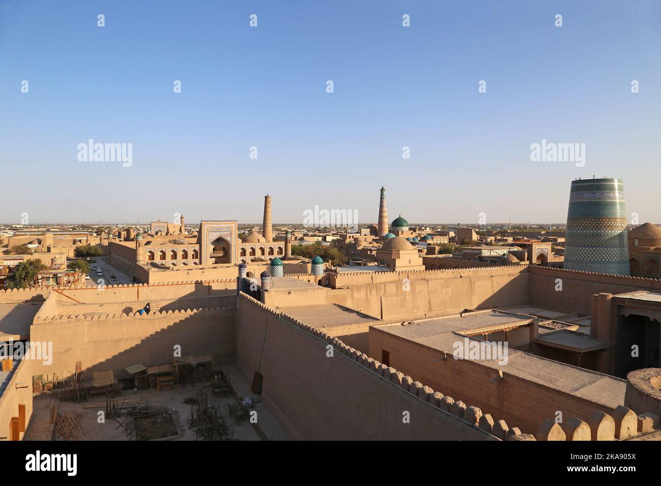 View from Kunya Ark Palace roof terrace at sunset, Ichan Kala (Inner ...