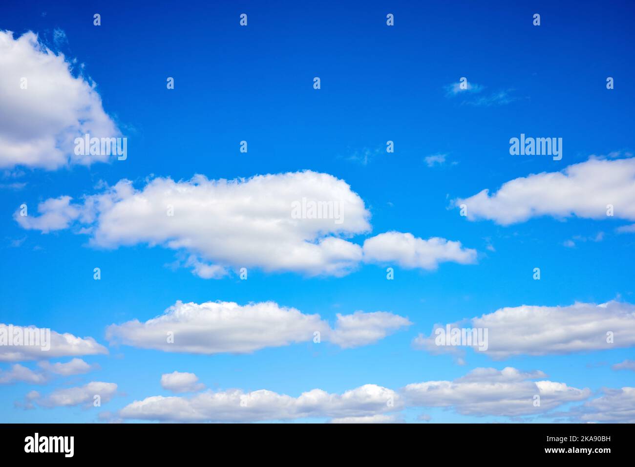 Daytime blue sky with white clouds Stock Photo - Alamy