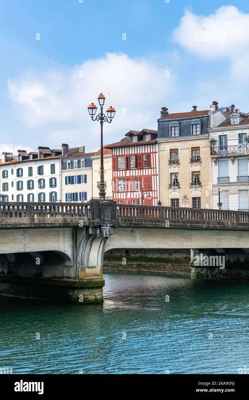 Bayonne in the pays Basque, typical facades and bridge on the river ...
