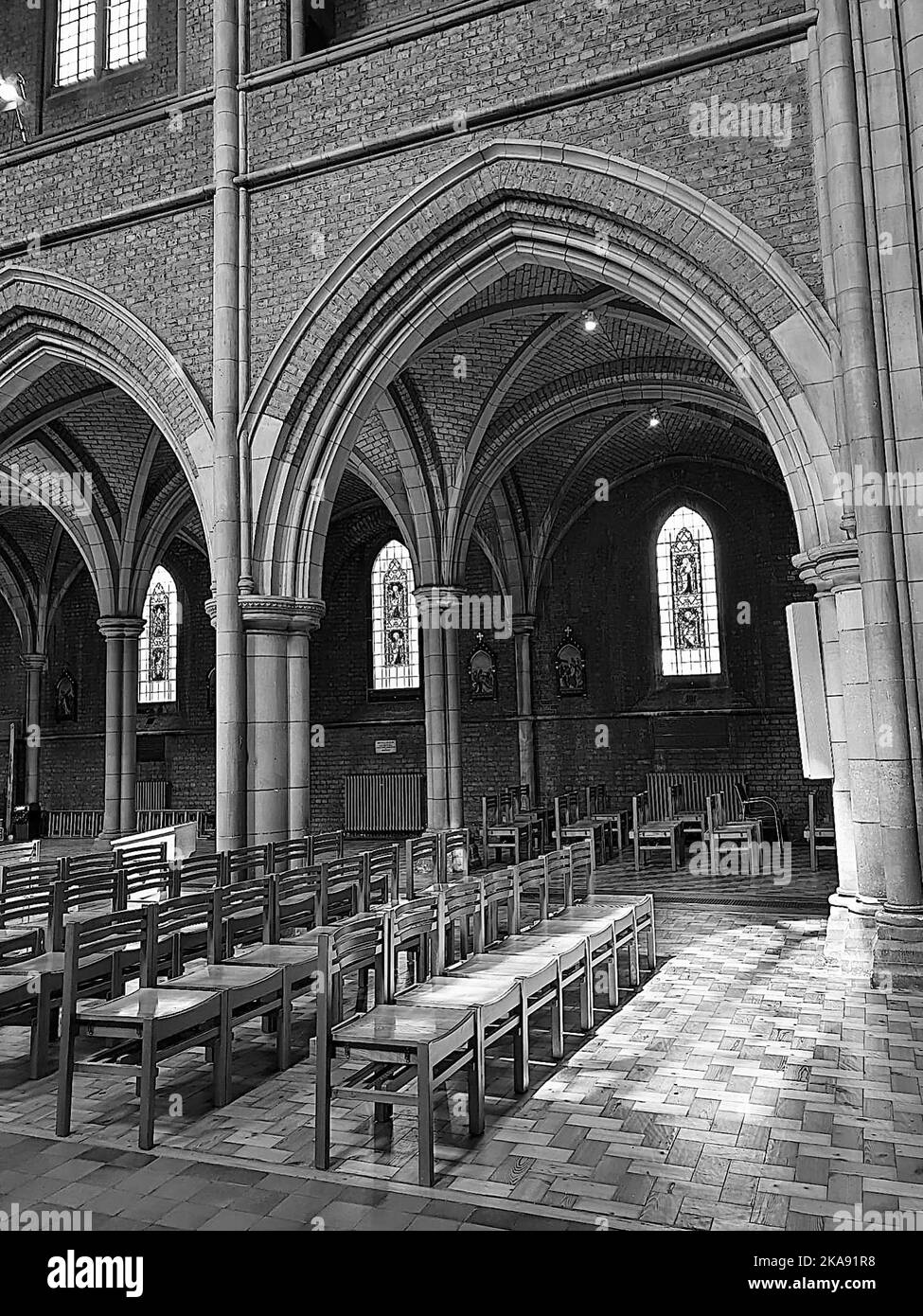 A grayscale of the church interior with beautiful architectural details ...