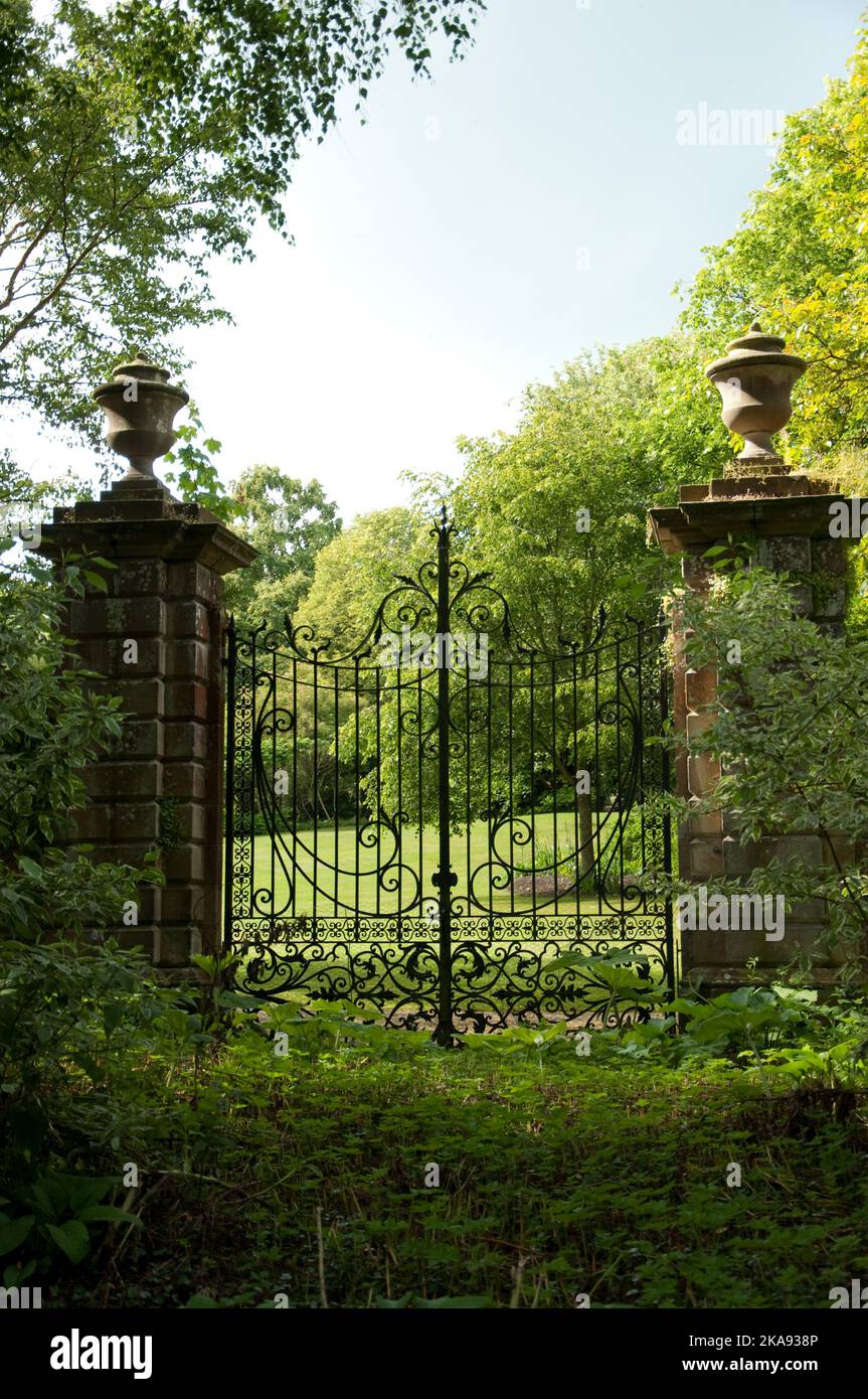 Beautiful iron gate separating fields in Wallington Hall, which was ...