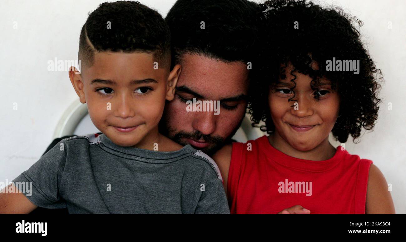 Hispanic children with father together. Latin mixed race kids with ...