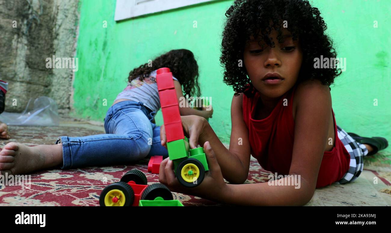 Hispanic children playing with toys. Latin south american kids3 Stock ...