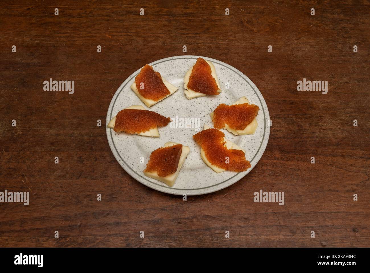 Typical Galician tapa of tetilla cheese topped with pieces of quince ...