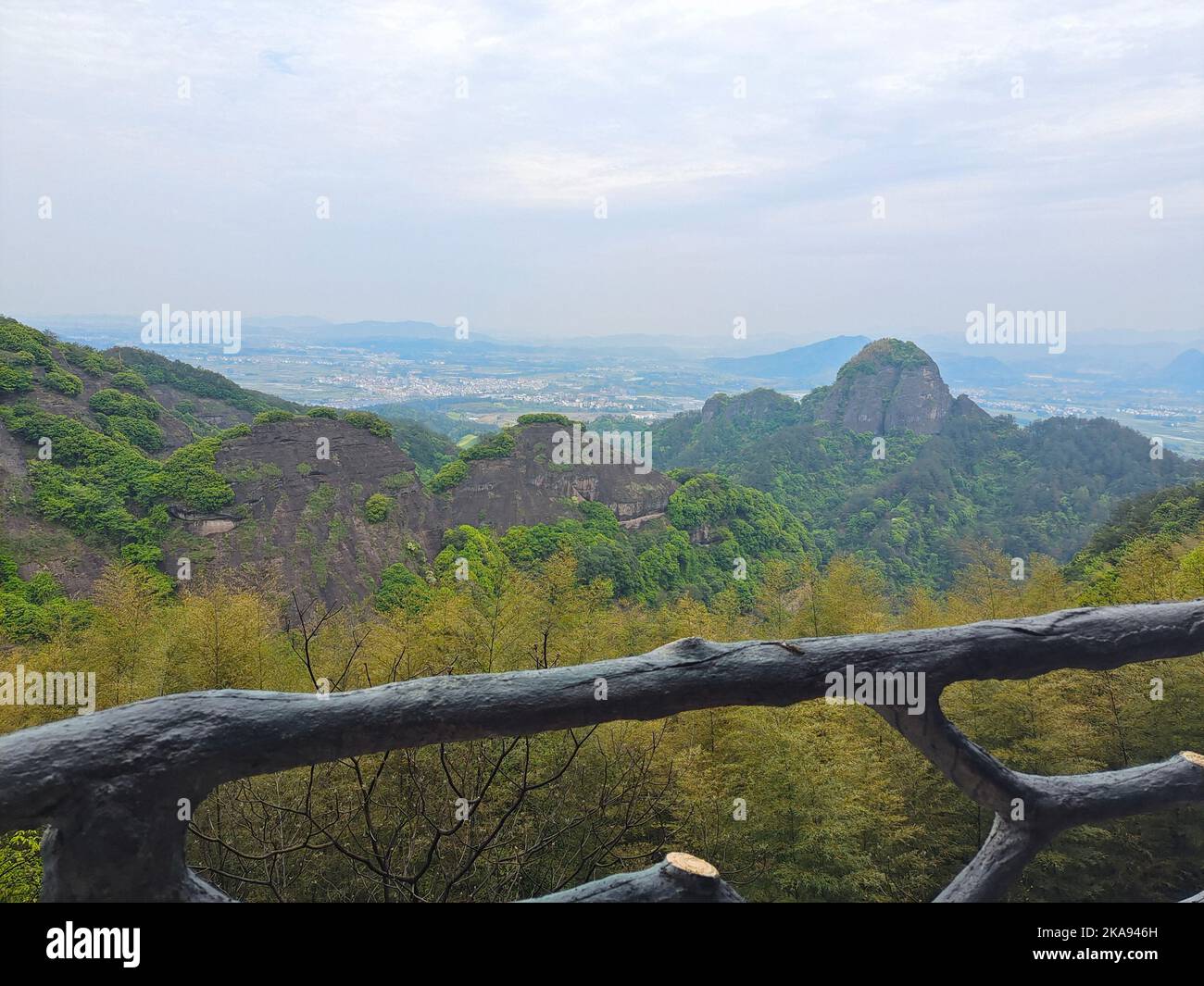 An aerial view of beautiful mountain landscape surrounded by green ...