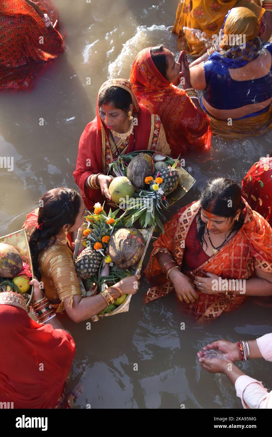 Oct 30, 2022, Kolkata, India: Hindu devotees pray on the riverbank of ...