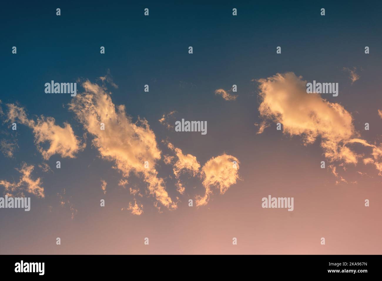A beautiful view of a sky with clouds at sunset Stock Photo - Alamy
