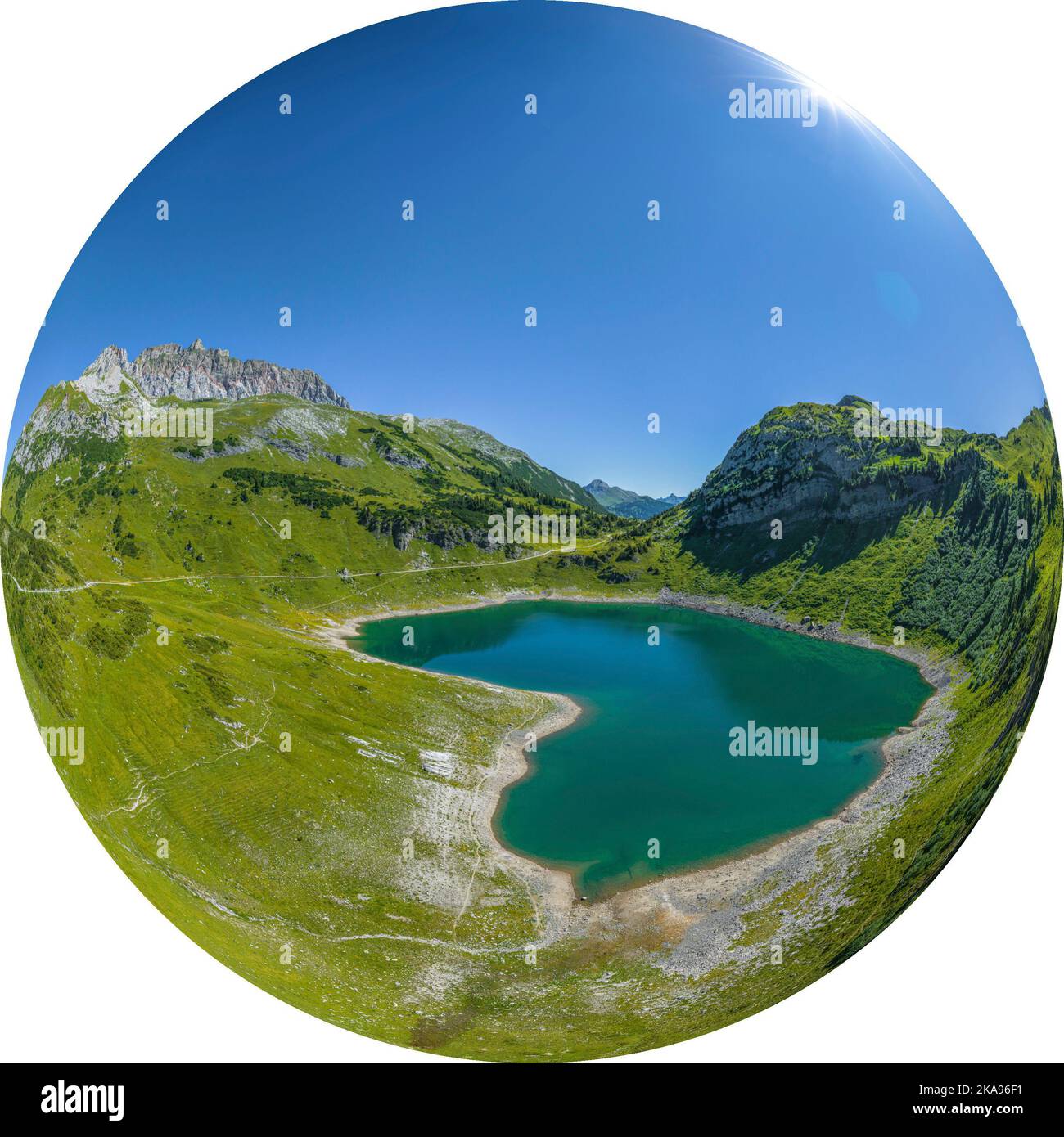 The beautiful situated Formarin Lake in the Arlberg region from above ...
