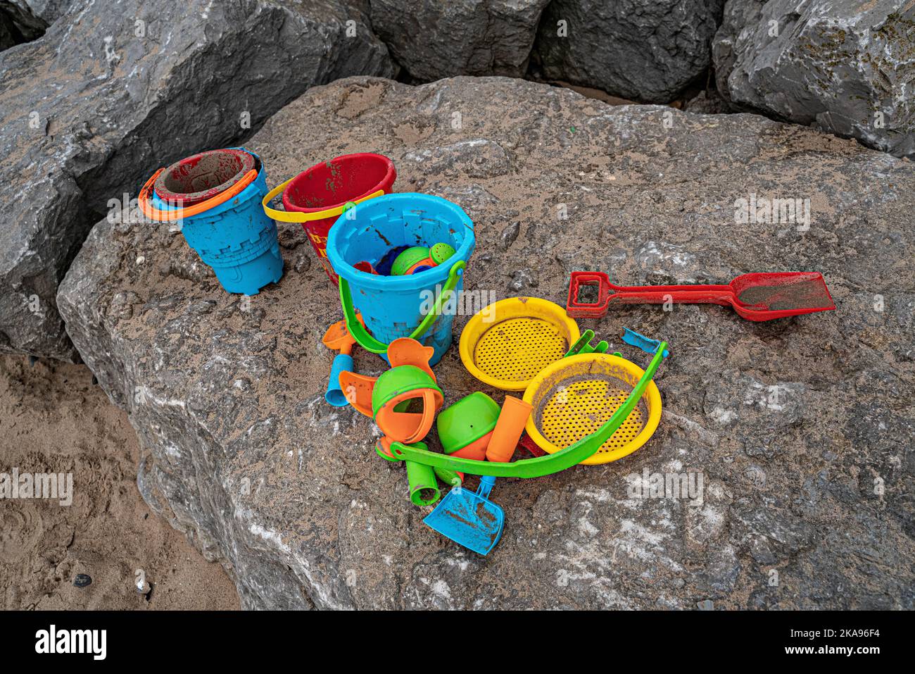 Bucket and spade left at the beach hi-res stock photography and images ...