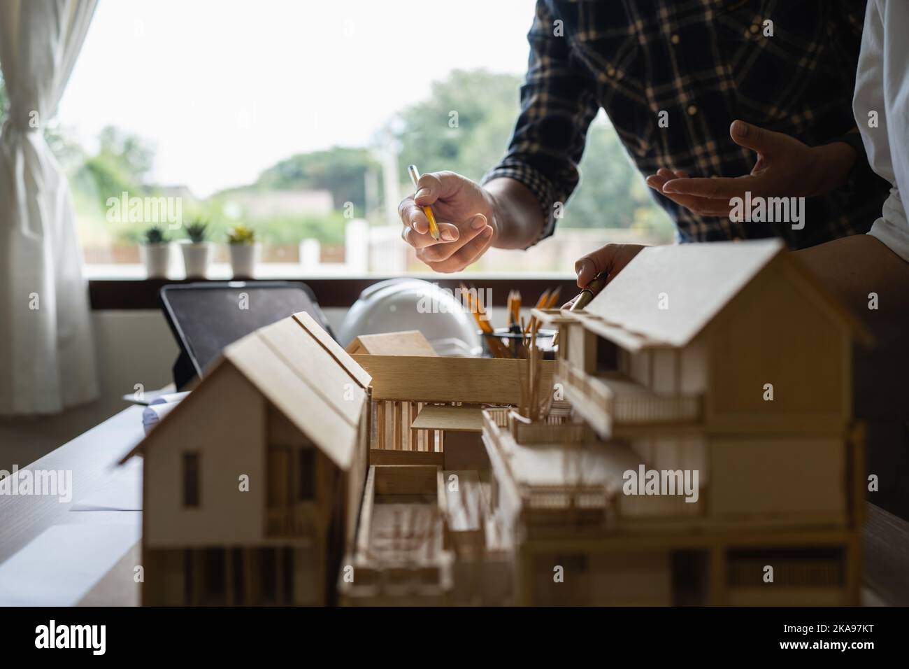 Architect man working with blueprints for architectural plan, engineer ...