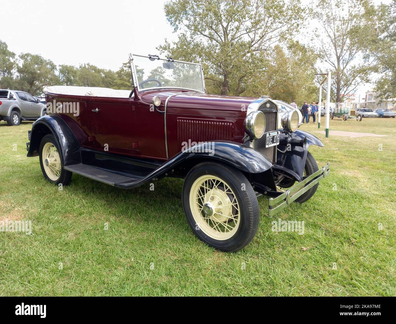 Old red maroon Ford Model B 1932 four door convertible. Side view ...