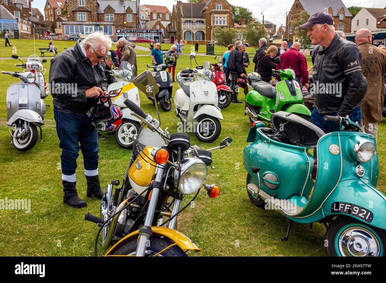Scooter and motorcycle enthusiasts meeting on the cliff tops at ...