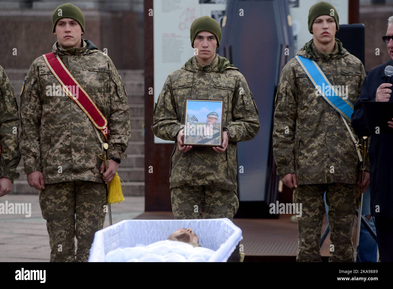 KYIV, UKRAINE - OCTOBER 29, 2022 - Servicemen stand to attention behind ...