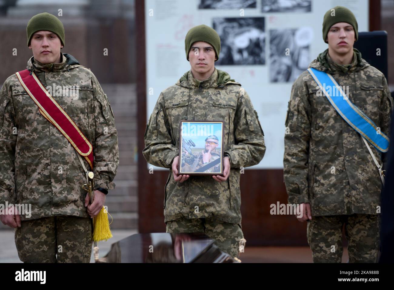 KYIV, UKRAINE - OCTOBER 29, 2022 - Servicemen stand to attention behind ...
