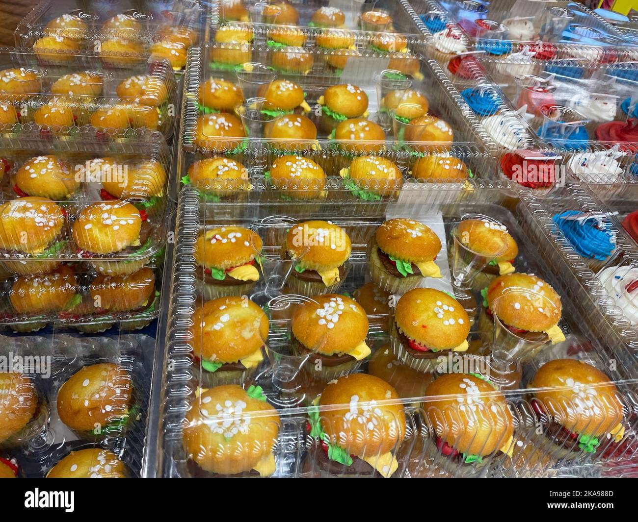 Augusta, Ga USA - 12 22 21: Rows of cupcakes on display in a retail ...