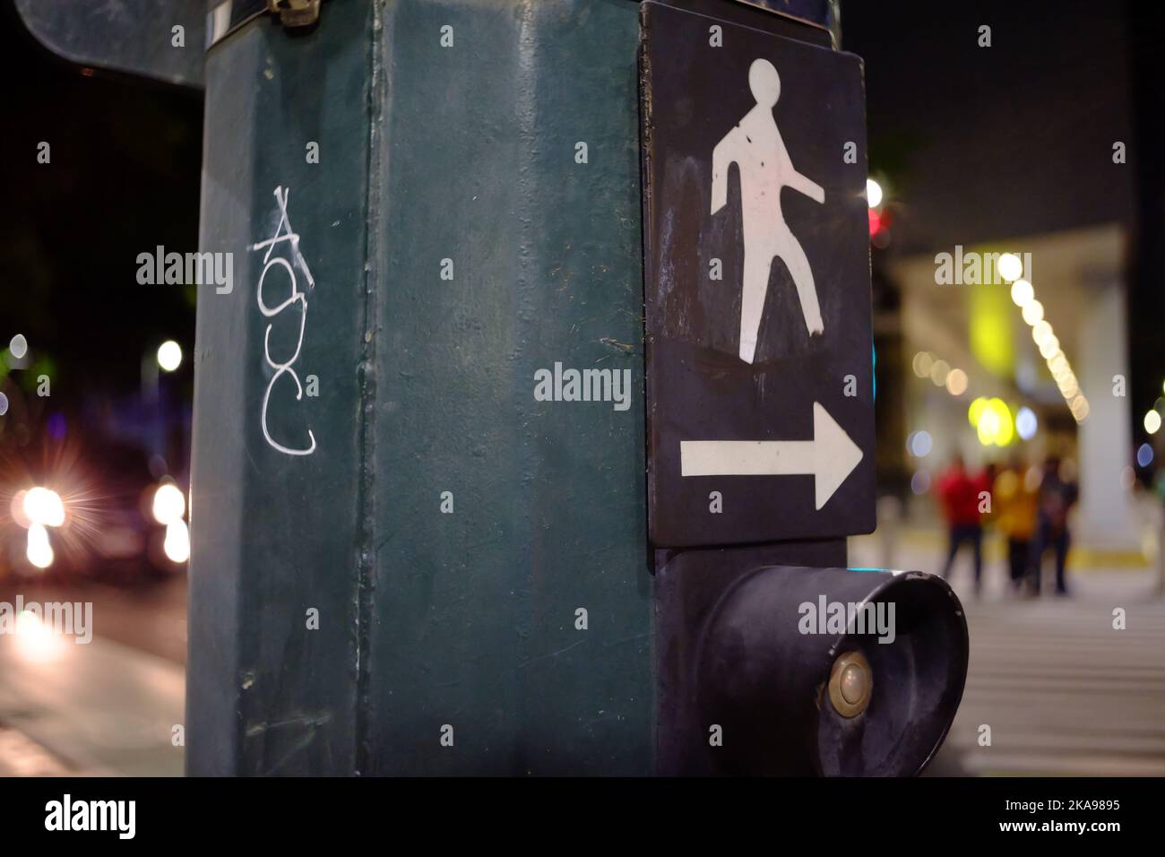 A pedestrian street sign at night Stock Photo - Alamy