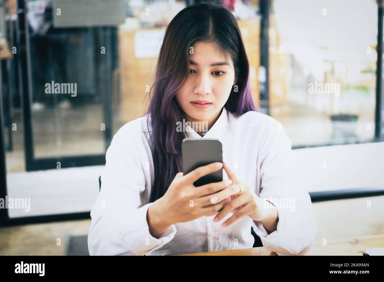 Employees show signs of boredom from working full time Stock Photo - Alamy