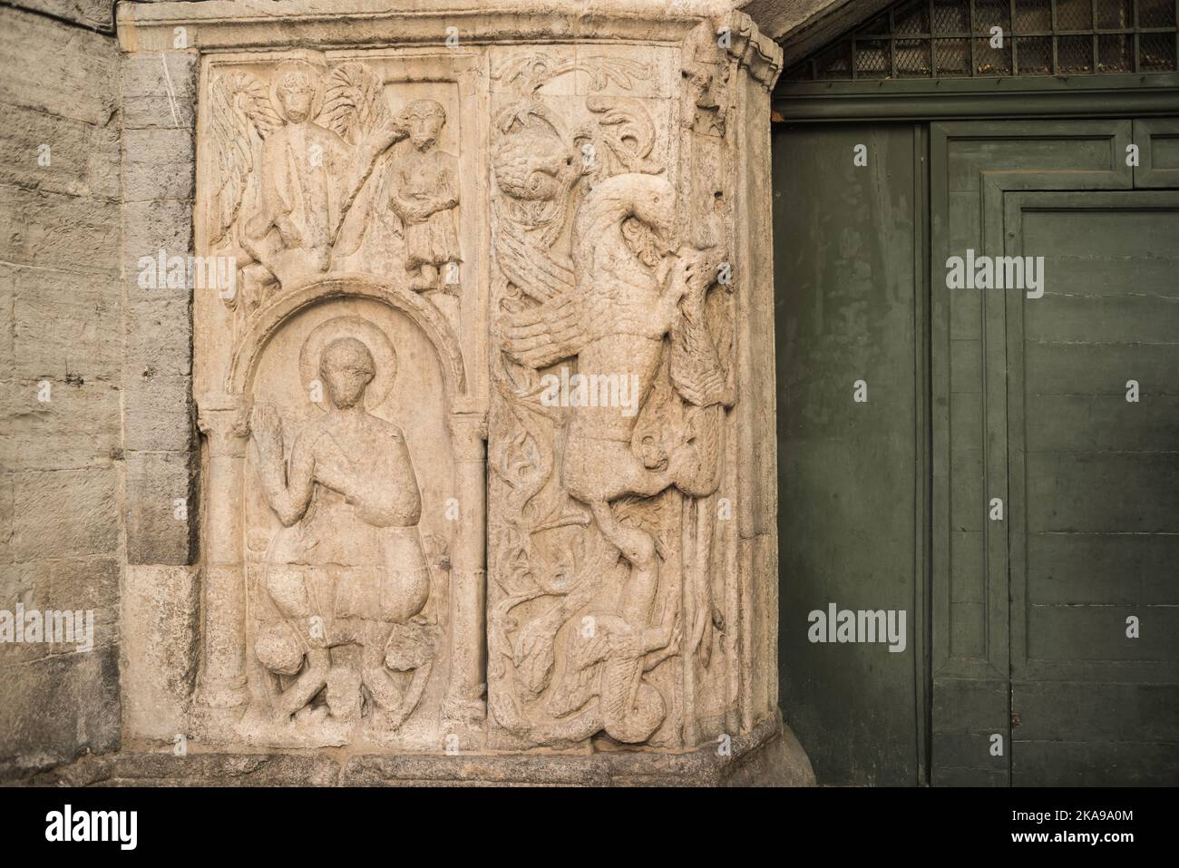 Basilica San Fedele, detail of the medieval west door of the Basilica ...