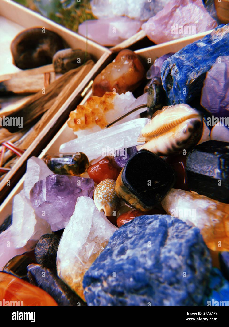 A vertical closeup of multicolored crystals for holistic healing Stock ...