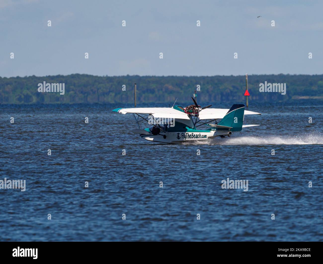 A float plane landing on the water in Chotawhatchee Bay, USA Stock ...