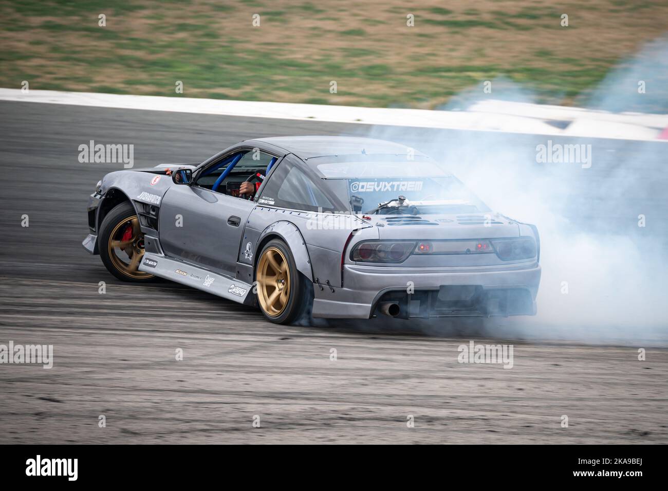 Nissan Silvia S13 5 drifting on the racing circuit, S13 S15 Stock Photo - Alamy