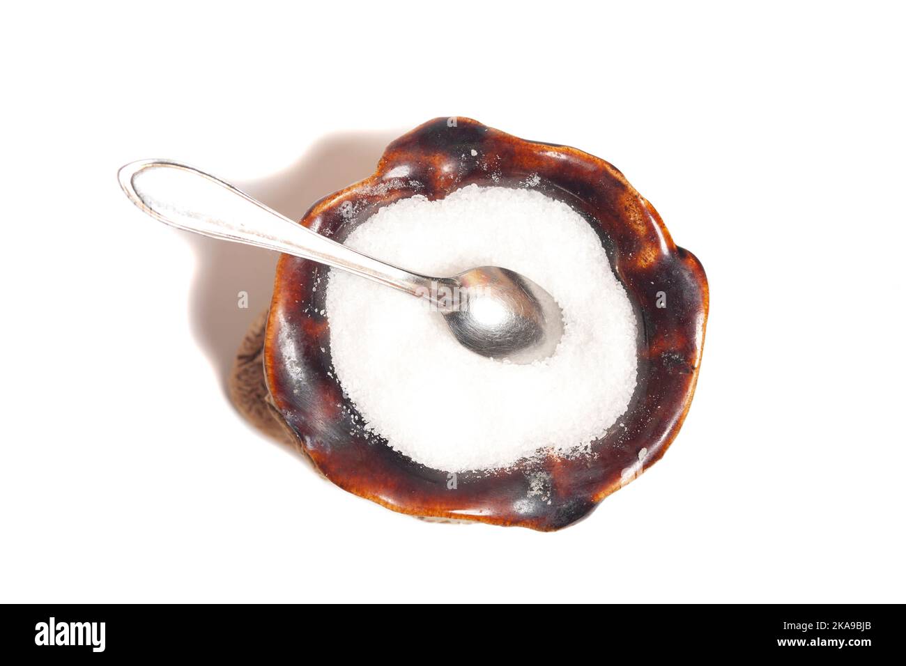 Bowl of white table salt isolated on white background, top view Stock ...