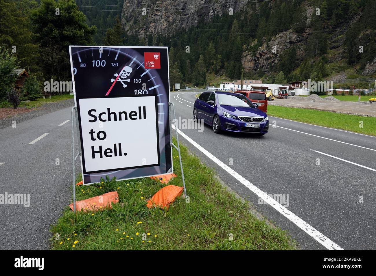Schnell to Hell, speeding road sign Autumn in the Oetztal Valley ...