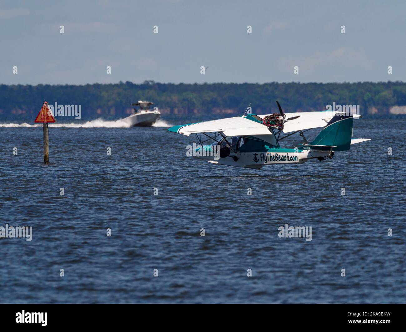 A float plane landing on the water in Chotawhatchee Bay, USA Stock ...
