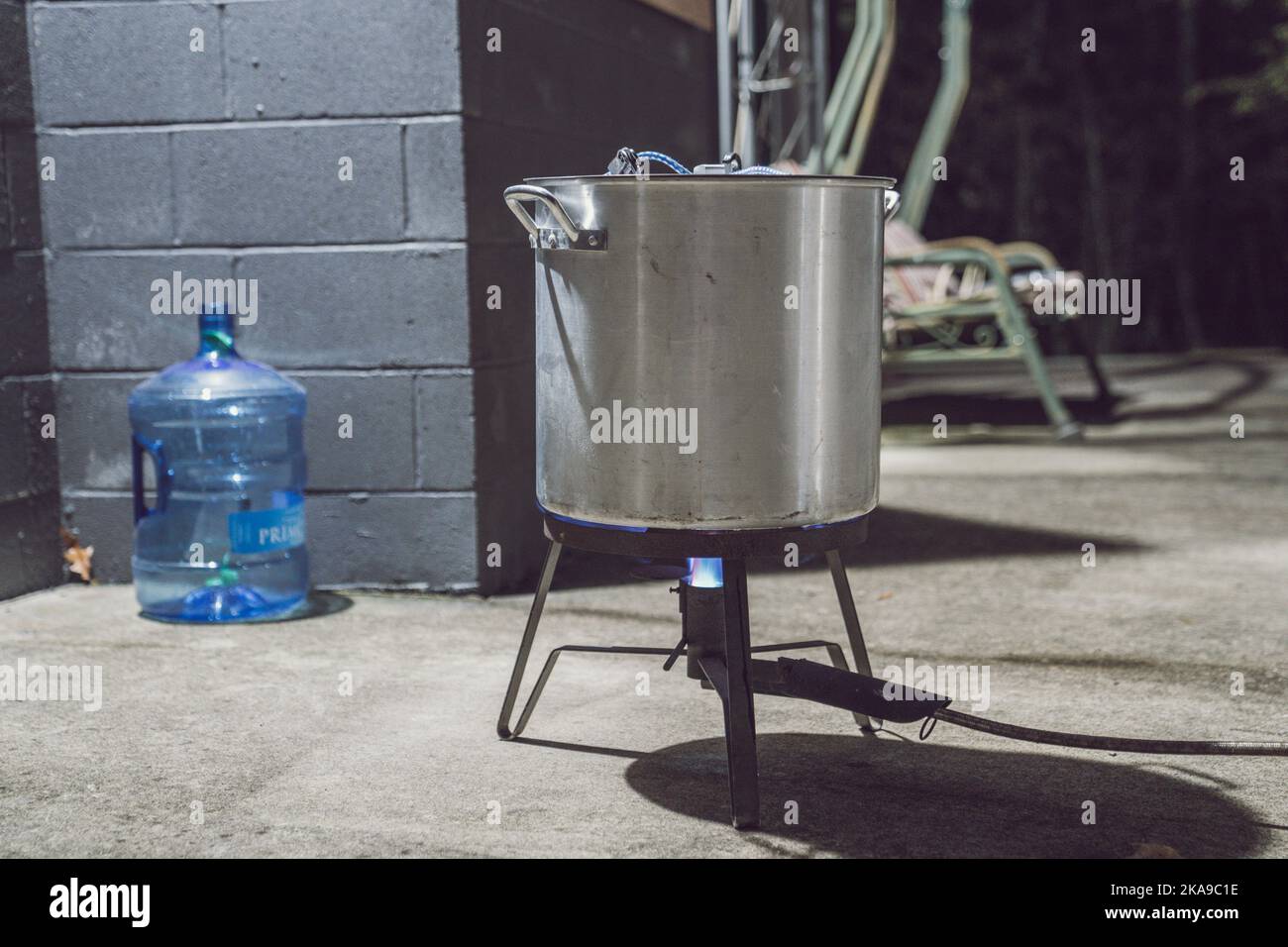 A pot cooking on a gas in an industrial setting Stock Photo - Alamy
