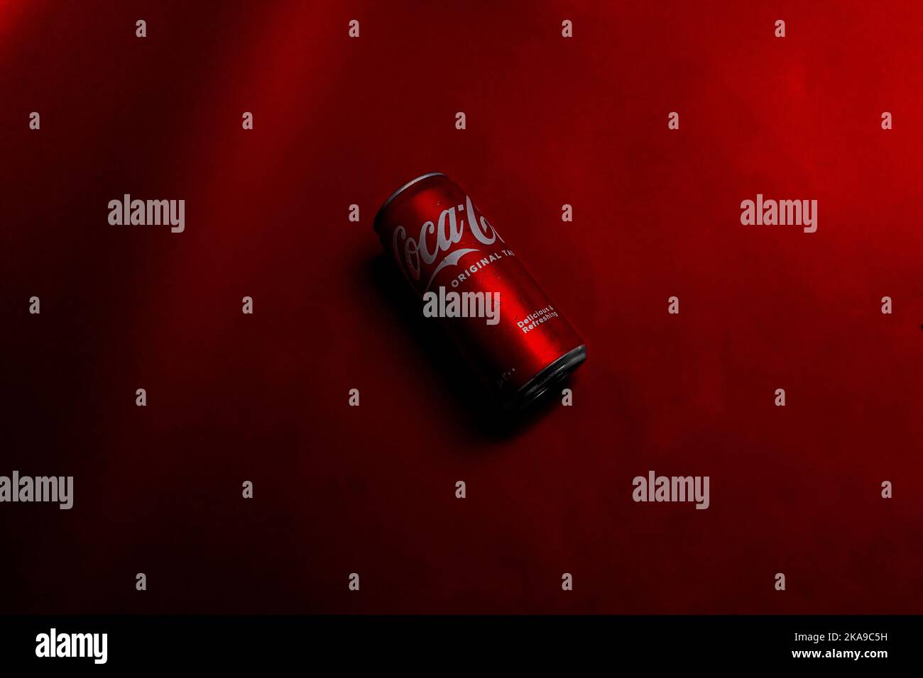 A closeup of Coca cola can under a light Stock Photo - Alamy