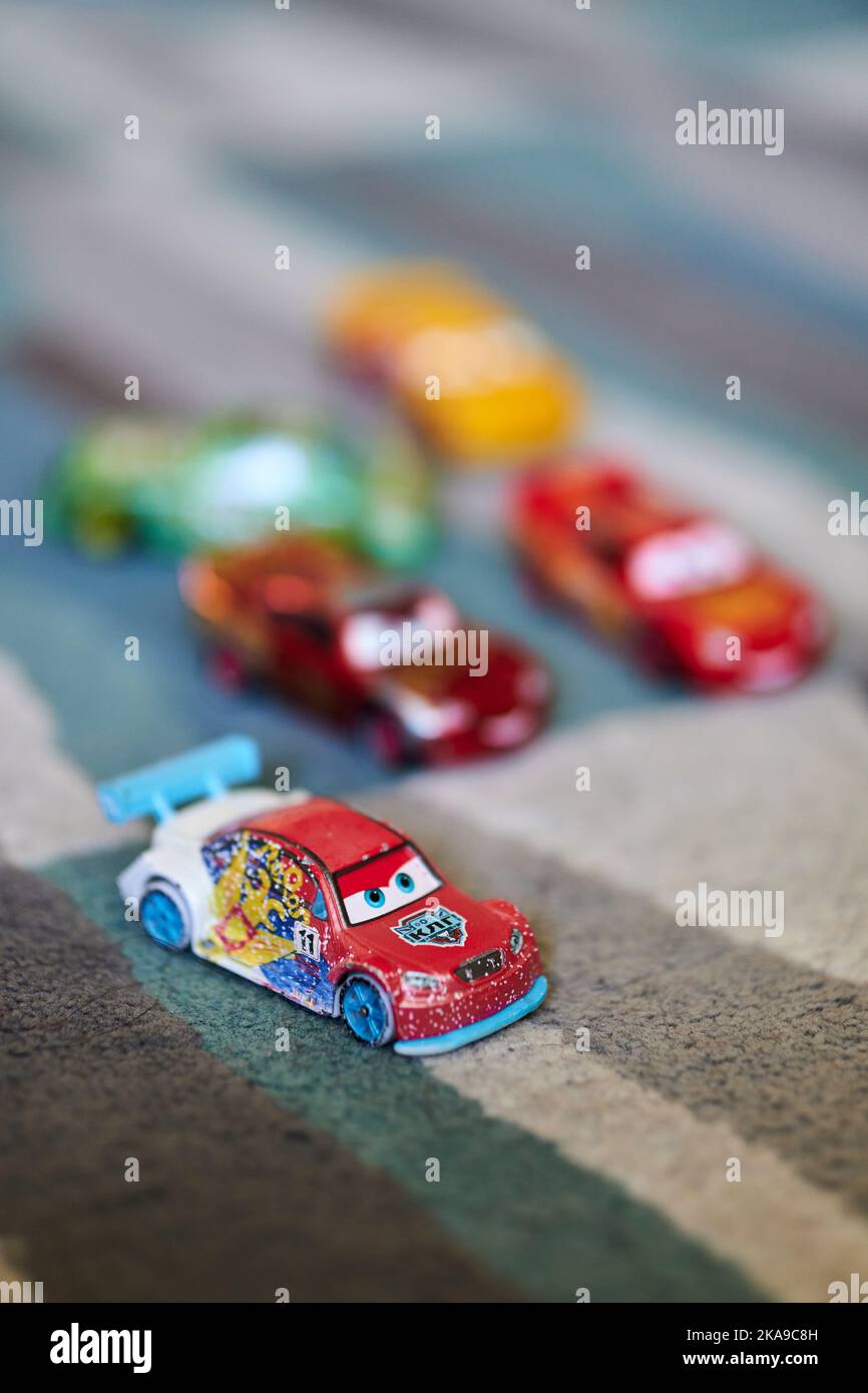 A vertical selective focus shot of Ice Racer toy car from the Disney ...