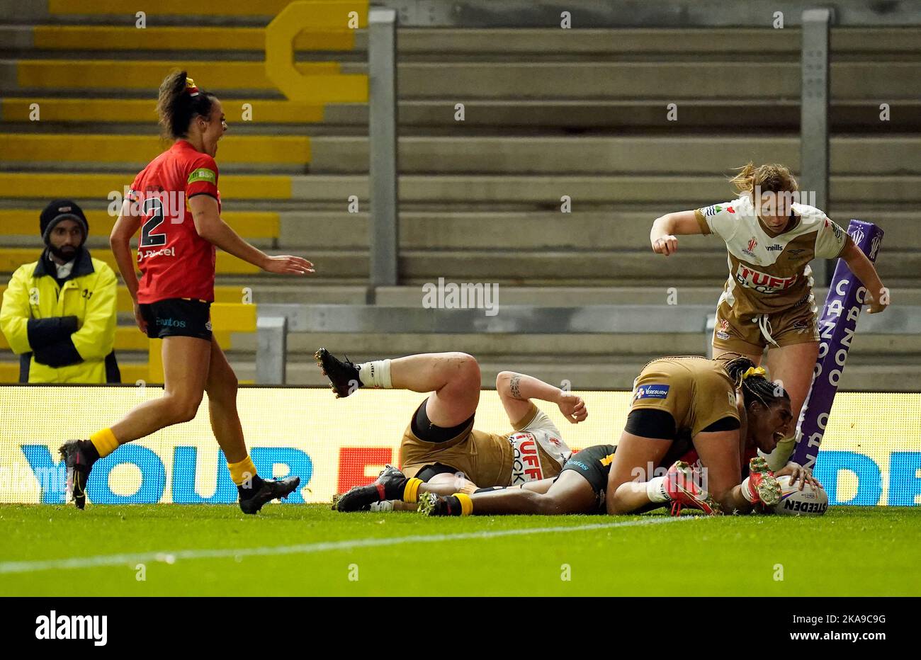 Papua New Guinea's Martha Molowia scores their side's second try of the ...