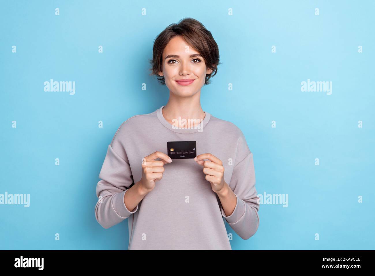 Portrait of gorgeous good mood woman bob hairdo dressed gray sweatshirt ...