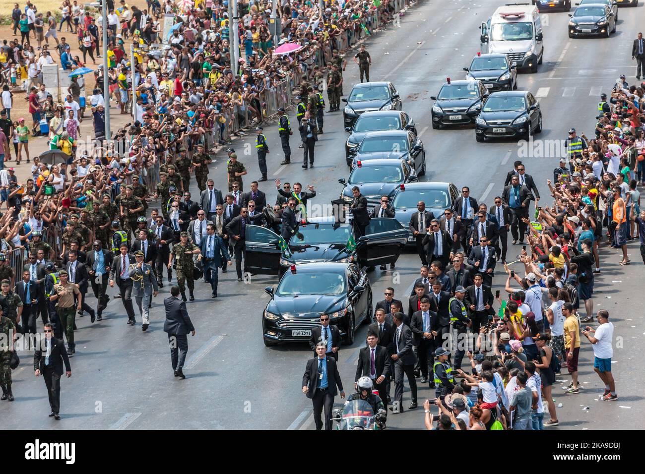 A Jair Bolsonaro president of Brasilia surrounded by cars and public ...